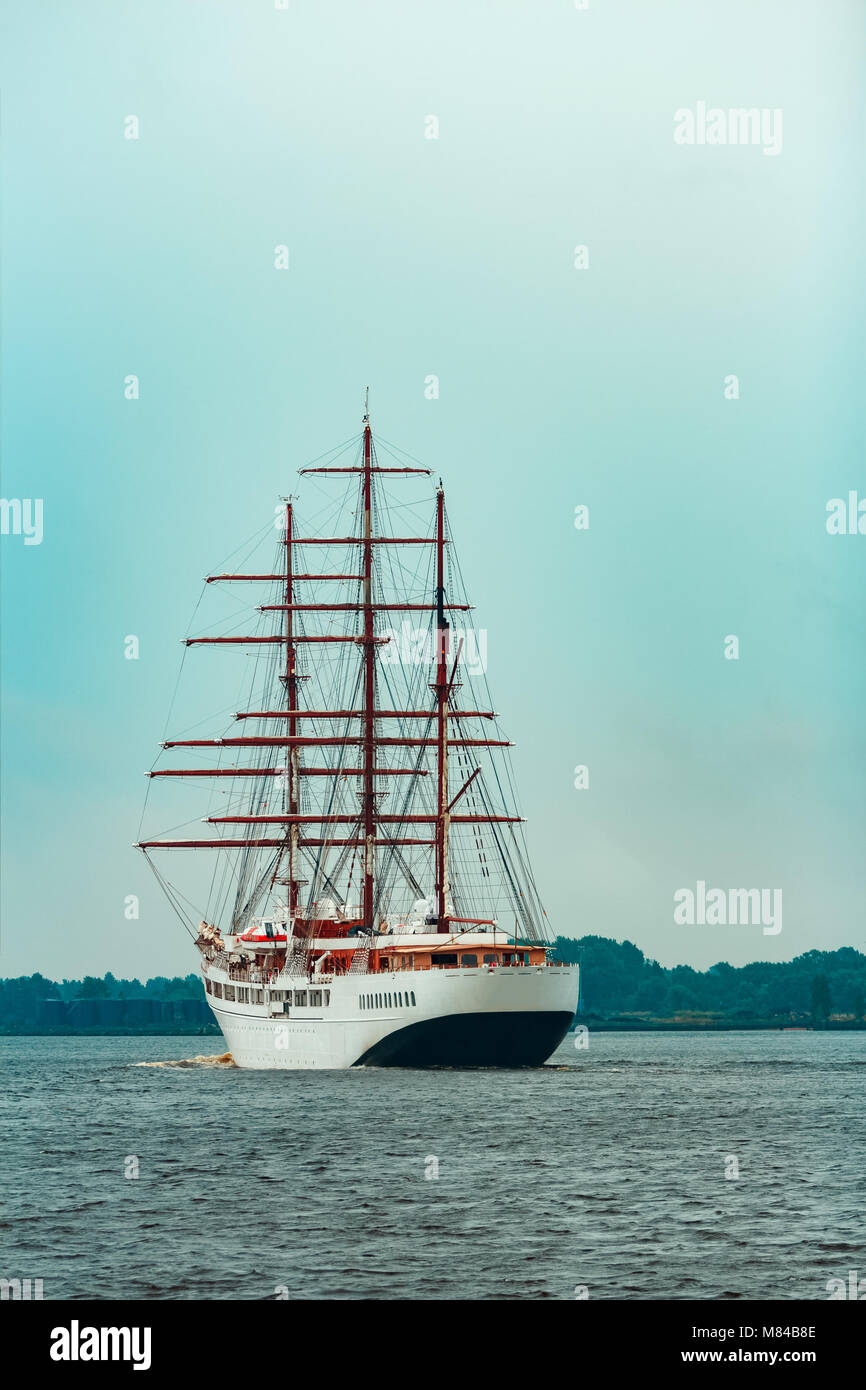 Big white sailing ship with three mast moving to the Riga port Stock ...