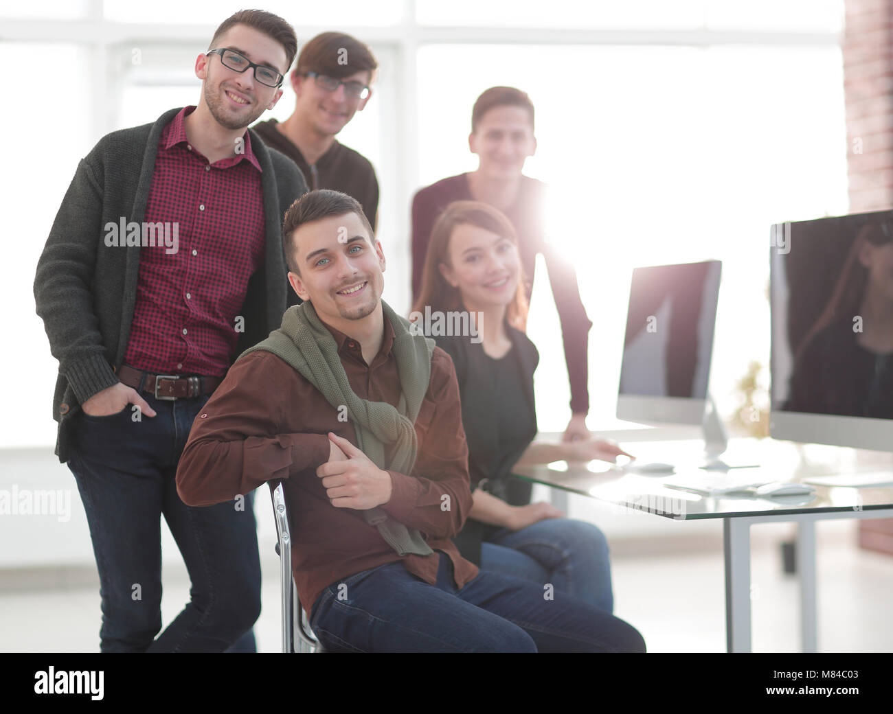 portrait of friendly business team in office Stock Photo - Alamy