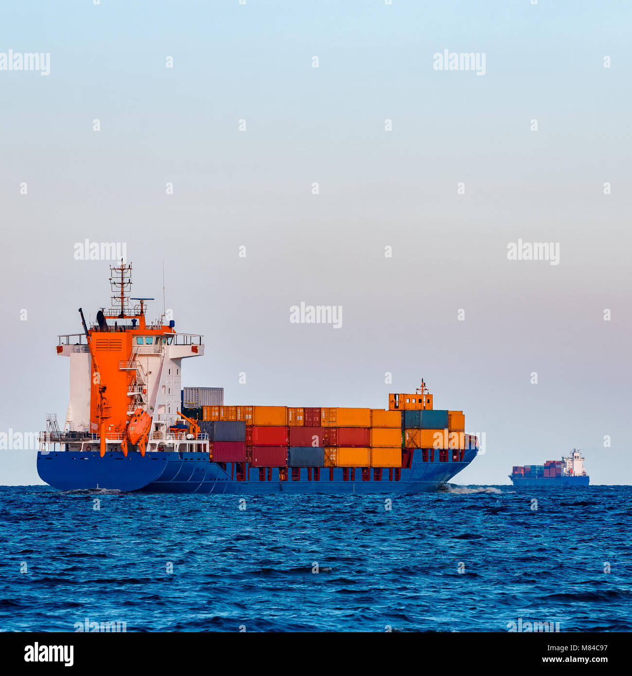 Blue container ship. Global logistics and merchandise transfer Stock ...