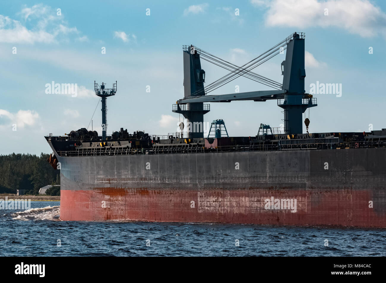 Black bulker ship. Logistics and merchandise transportations Stock ...