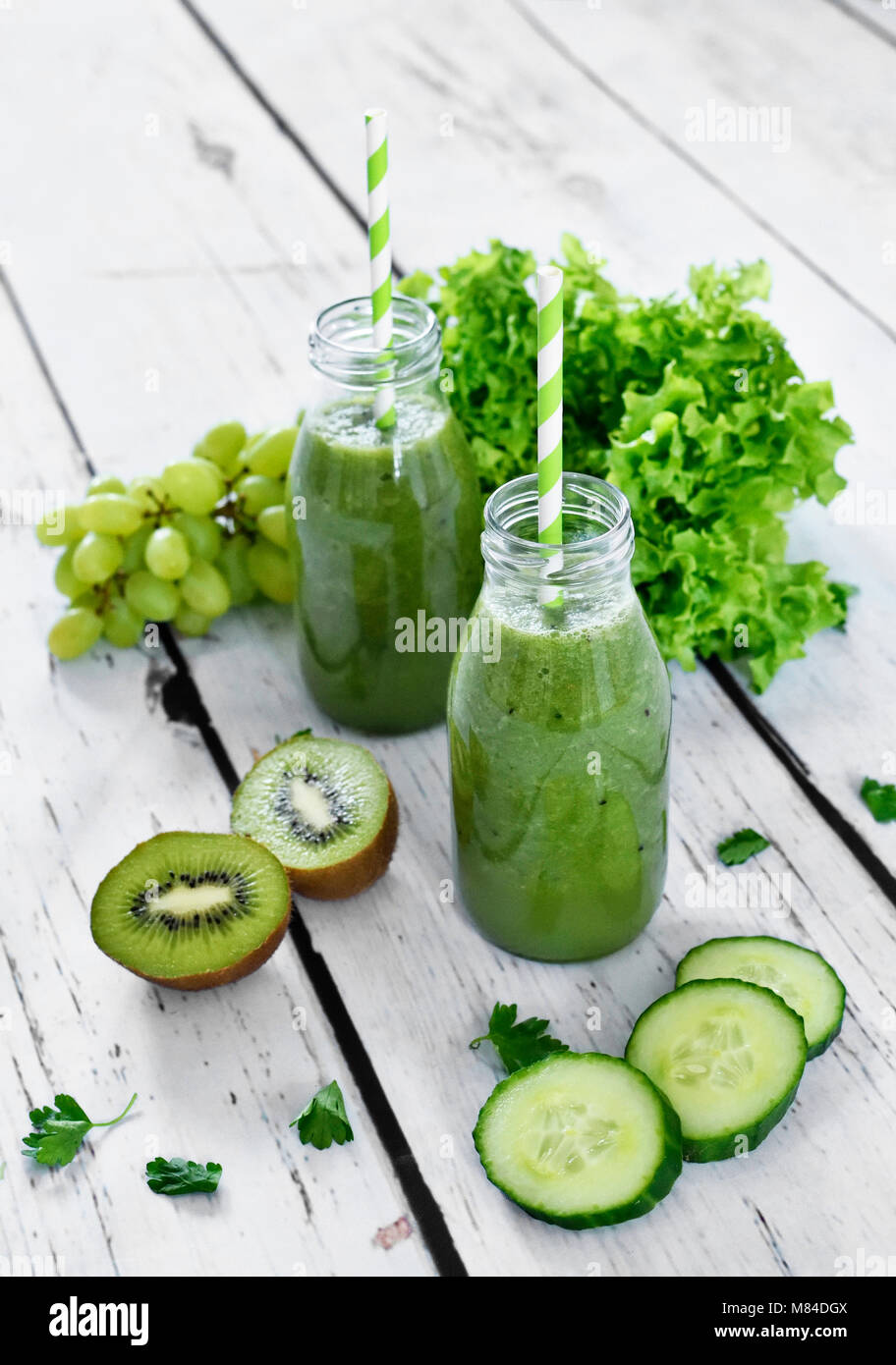 Green smoothie, healthy, organic drinks with fresh vegetables and ...