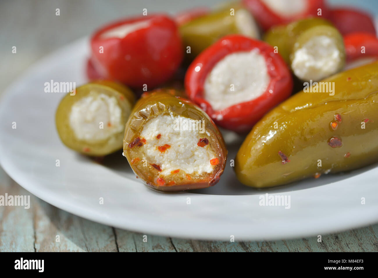 Hot spicy peppers stuffed with cheese Stock Photo - Alamy