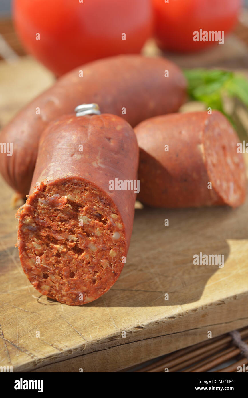Turkish sausage sucuk on a cutting board Stock Photo - Alamy