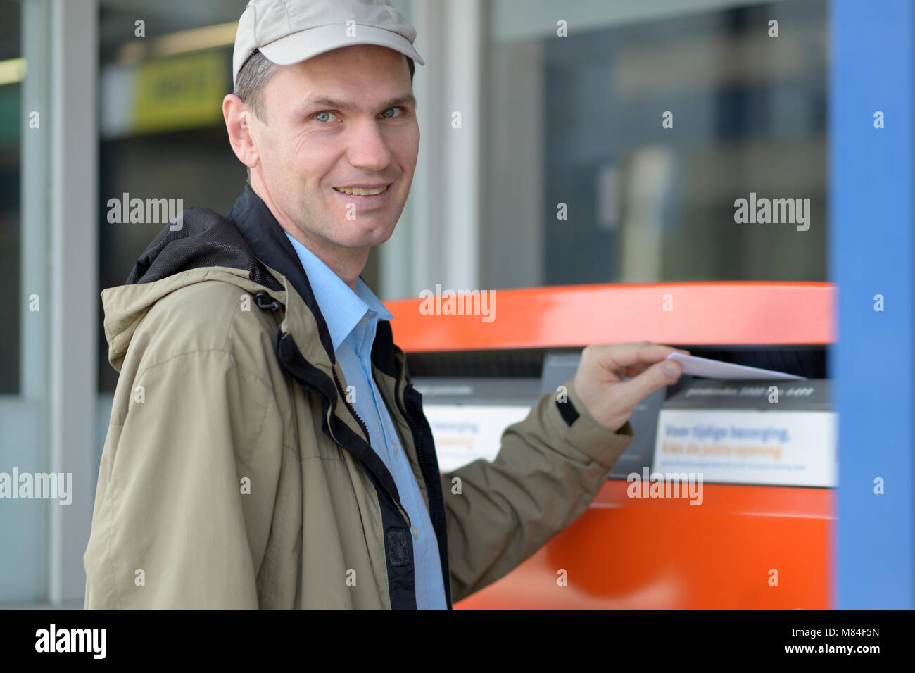 Dropping a letter hi-res stock photography and images - Alamy