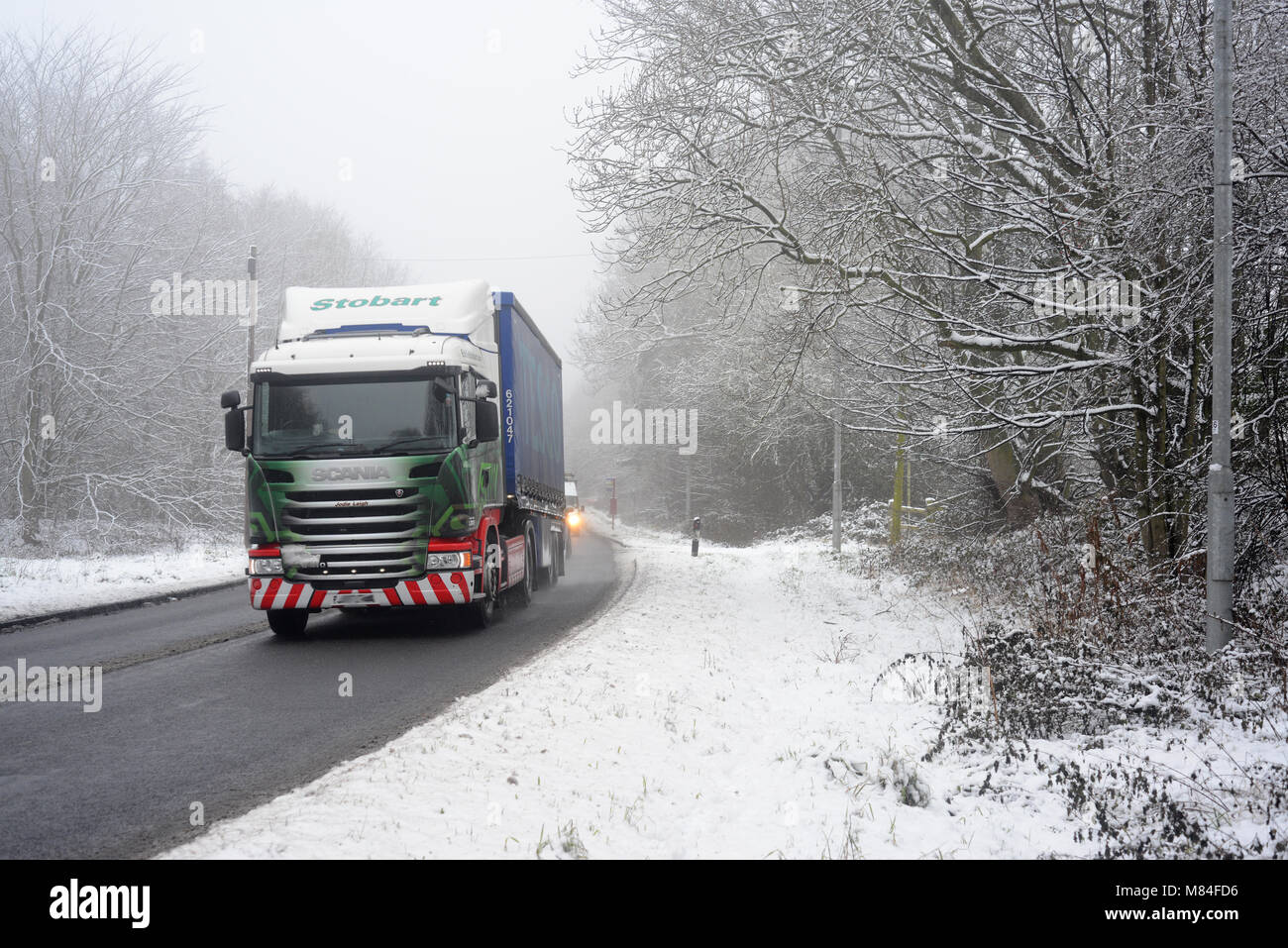 Driving lorry snow hi-res stock photography and images - Alamy