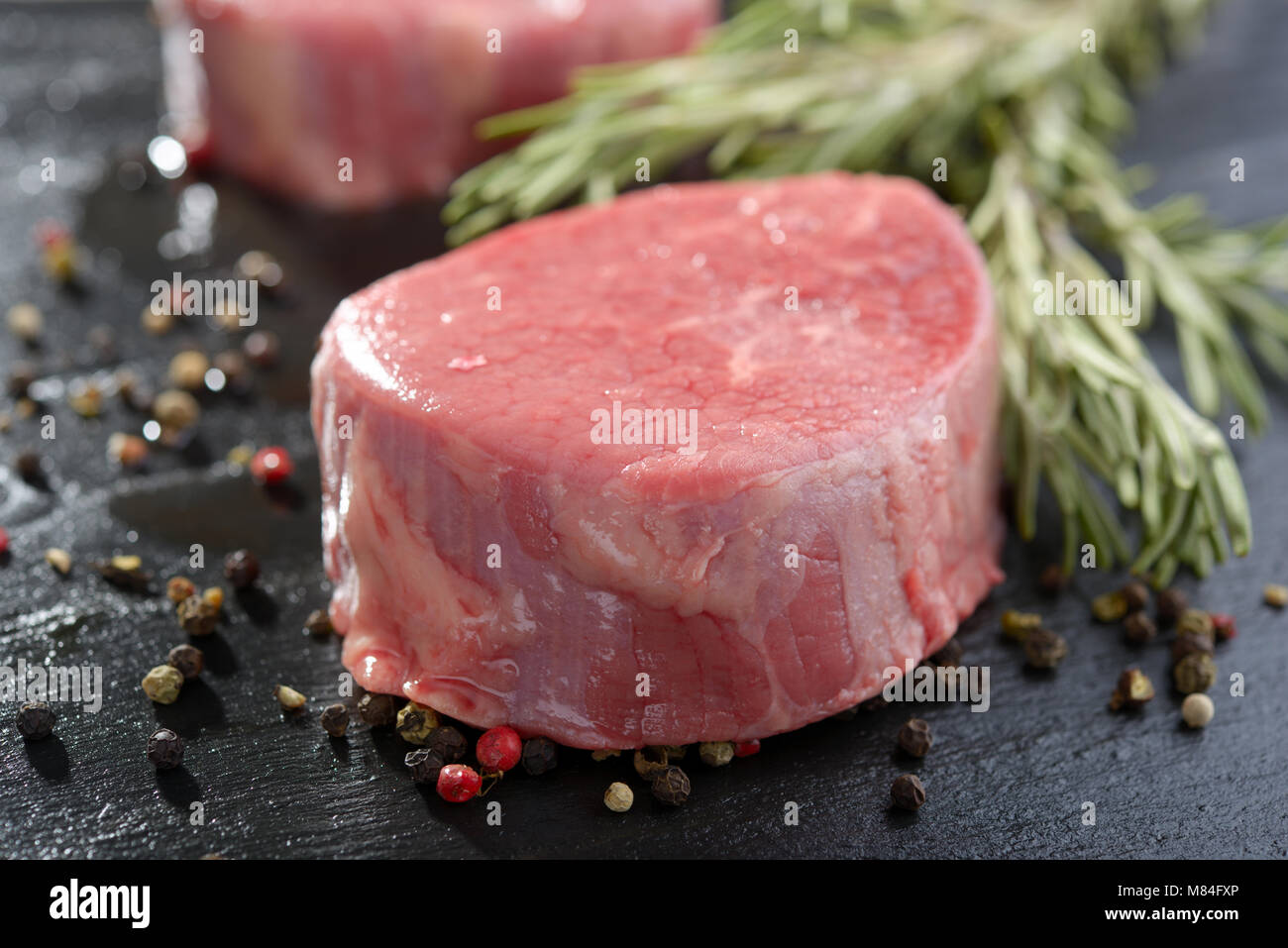 Raw Angus steak and spices Stock Photo - Alamy