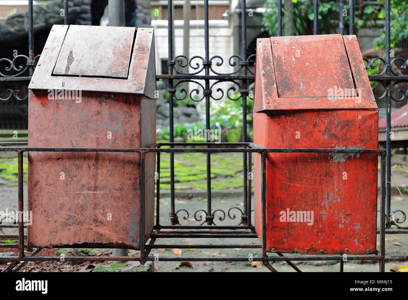 Rusty old metal waste containers in the courtyard of San Sebastian ...