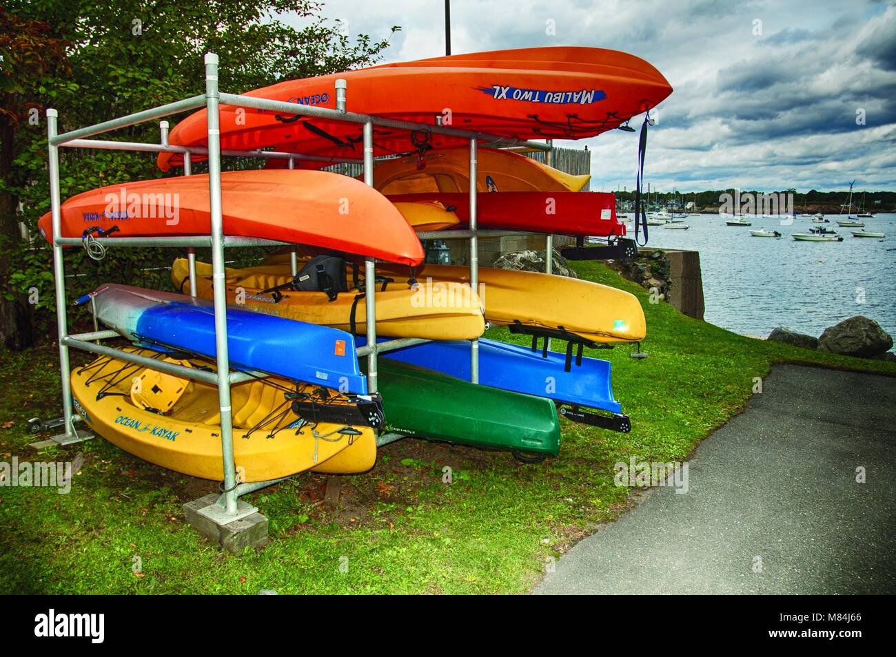 Display of many colorful kayaks Stock Photo - Alamy