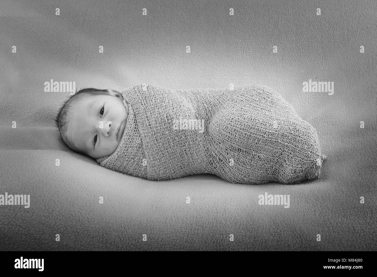 Swaddled baby wrap hi-res stock photography and images - Alamy