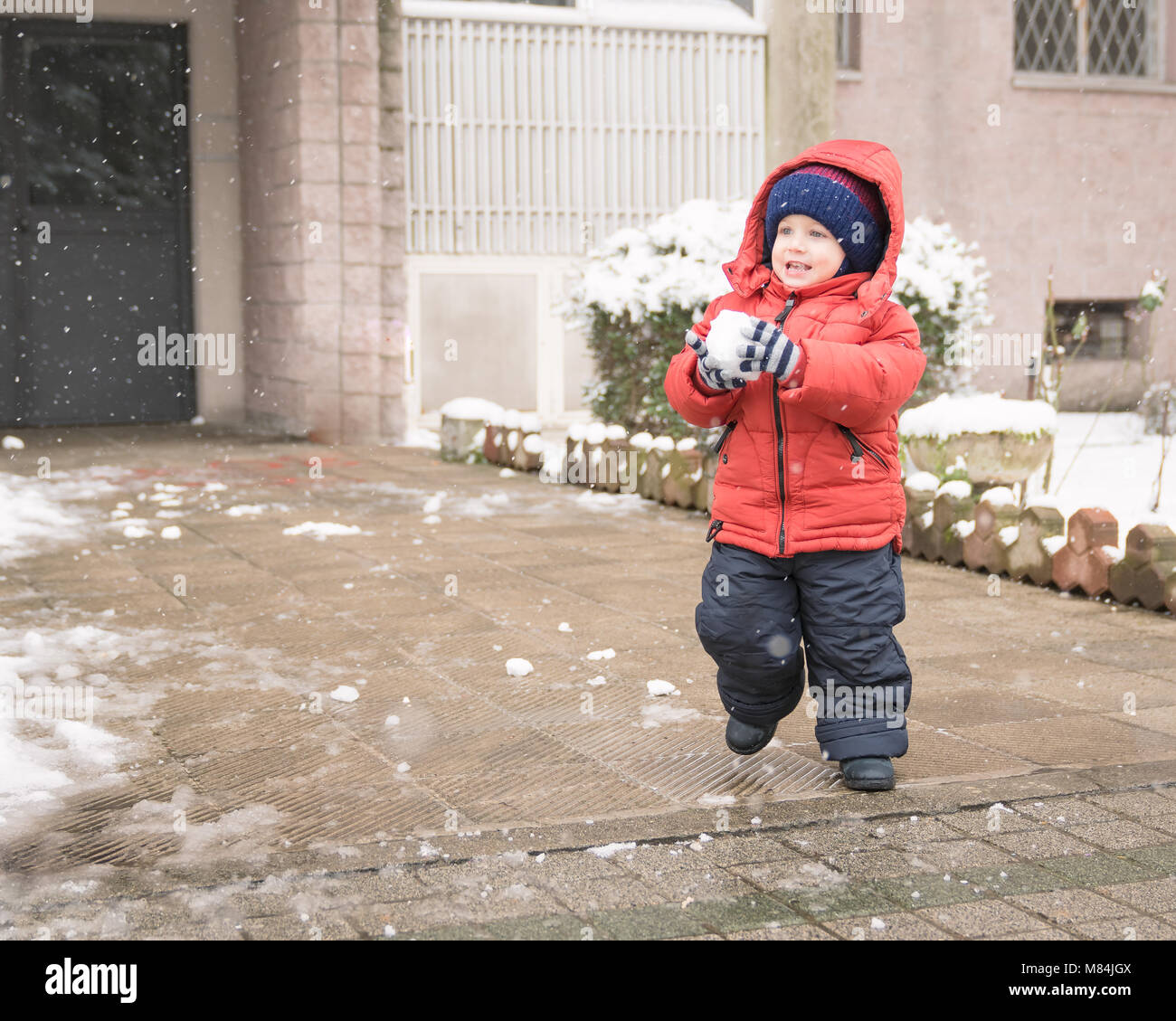 Baby in snowsuit hi-res stock photography and images - Alamy