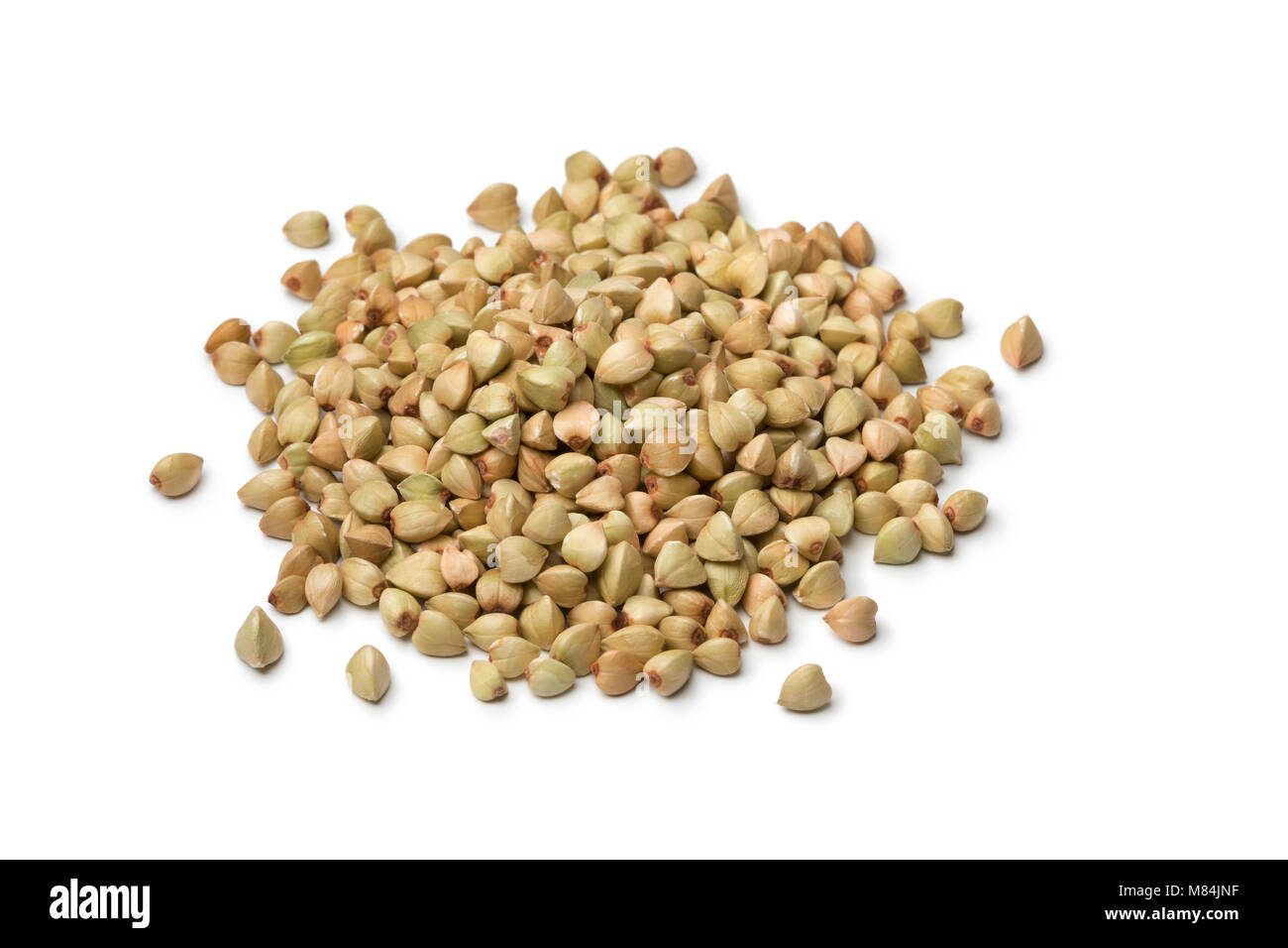Heap of dried buckwheat seeds isolated on white background Stock Photo ...