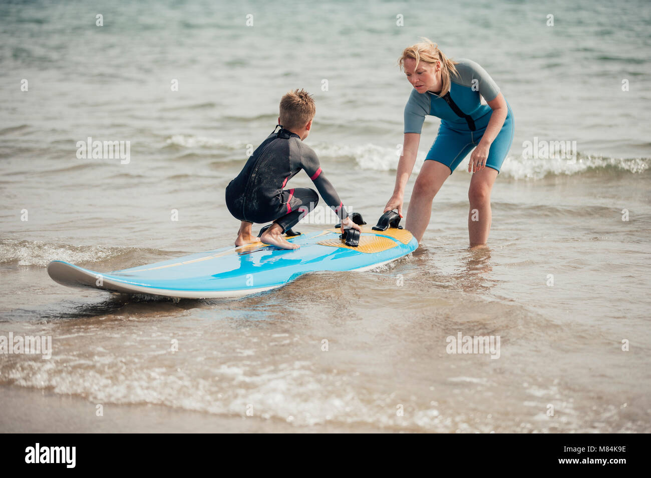 Teaching how to surf hi-res stock photography and images - Alamy