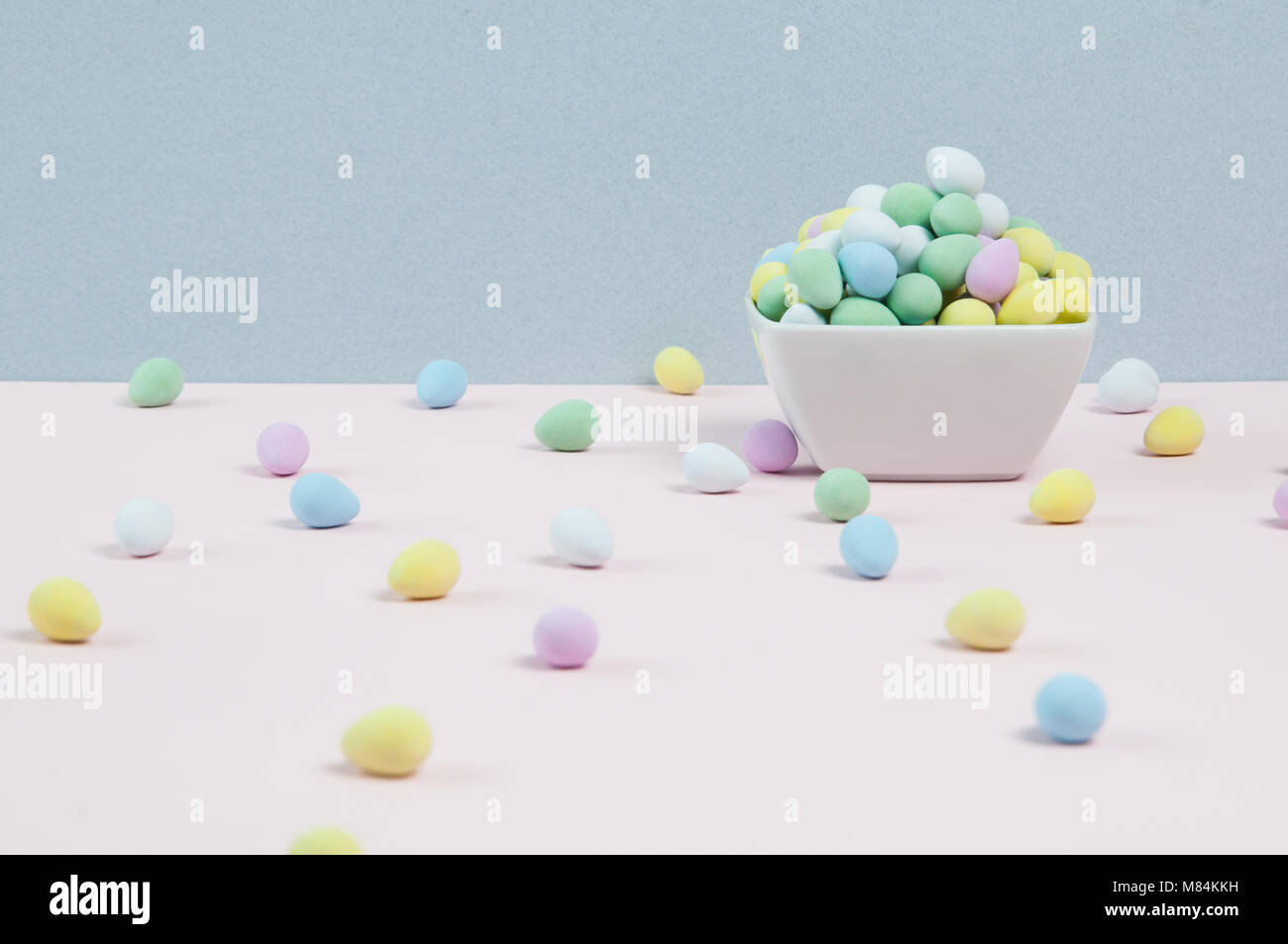colorful candy eggs in a white bowl Stock Photo - Alamy