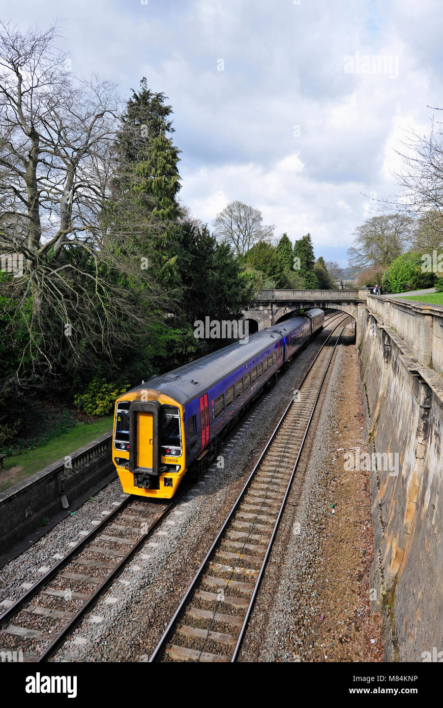 Diesel multiple unit train passes Sydney Gardens in Bath, England Stock ...
