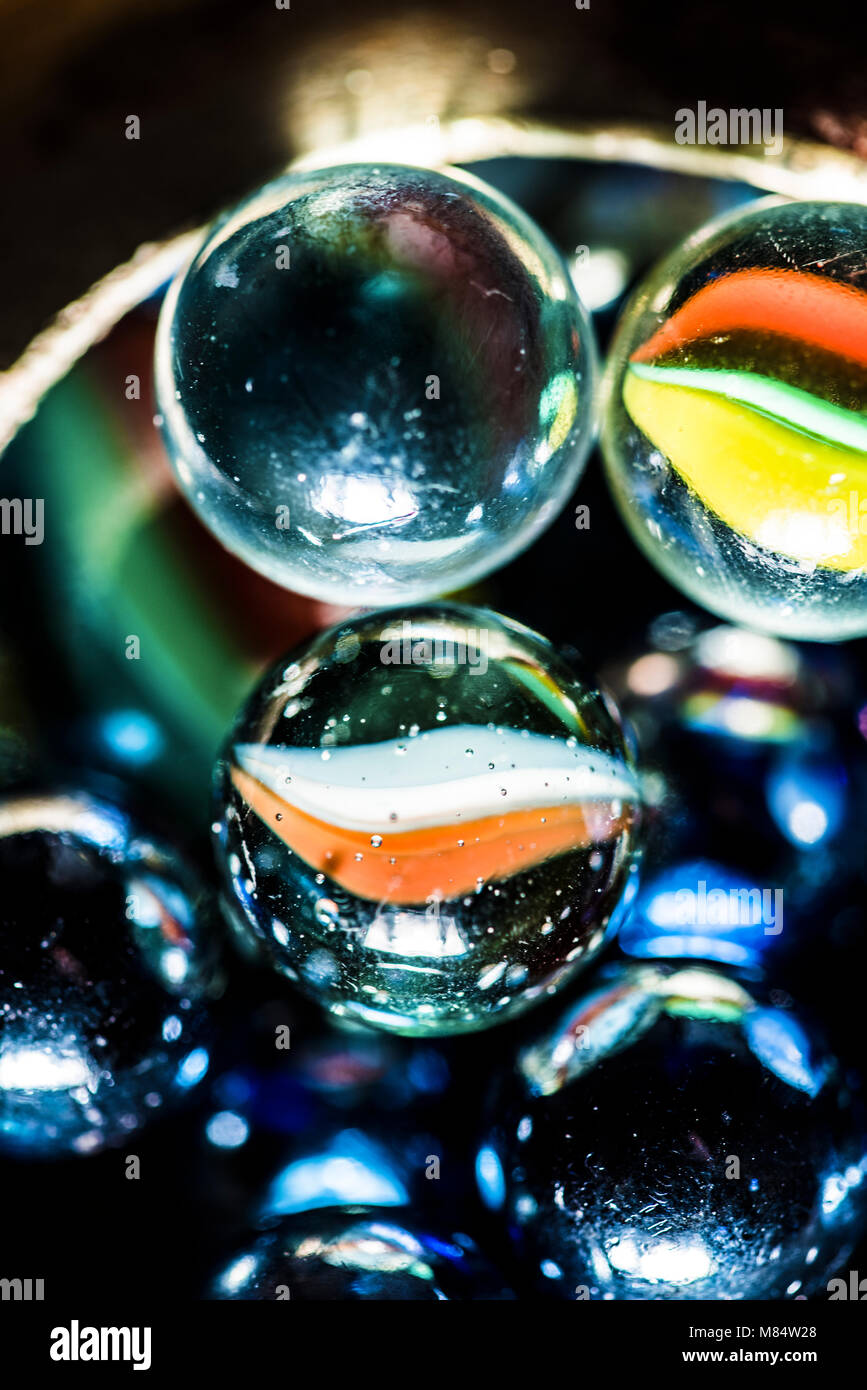 Colorful glass marbles macro close up Stock Photo - Alamy