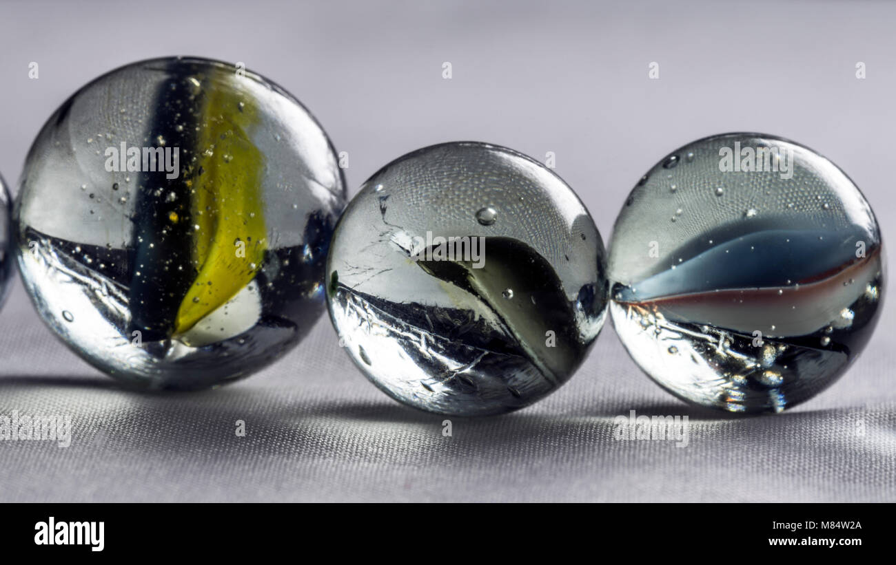 Colorful glass marbles macro close up Stock Photo - Alamy