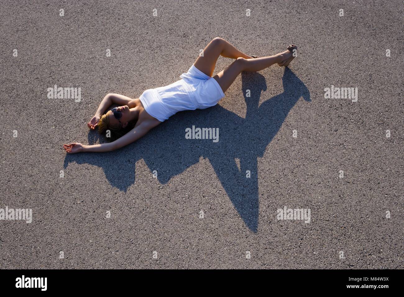 Laying lying down position posture hi-res stock photography and images ...