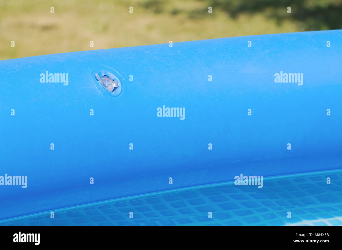 Inflatable Garden Pool Closeup with Inflation Valve Stock Photo - Alamy