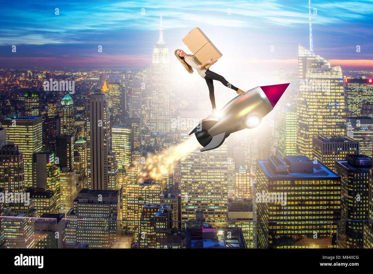 Woman in fast box delivery service on rocket Stock Photo - Alamy