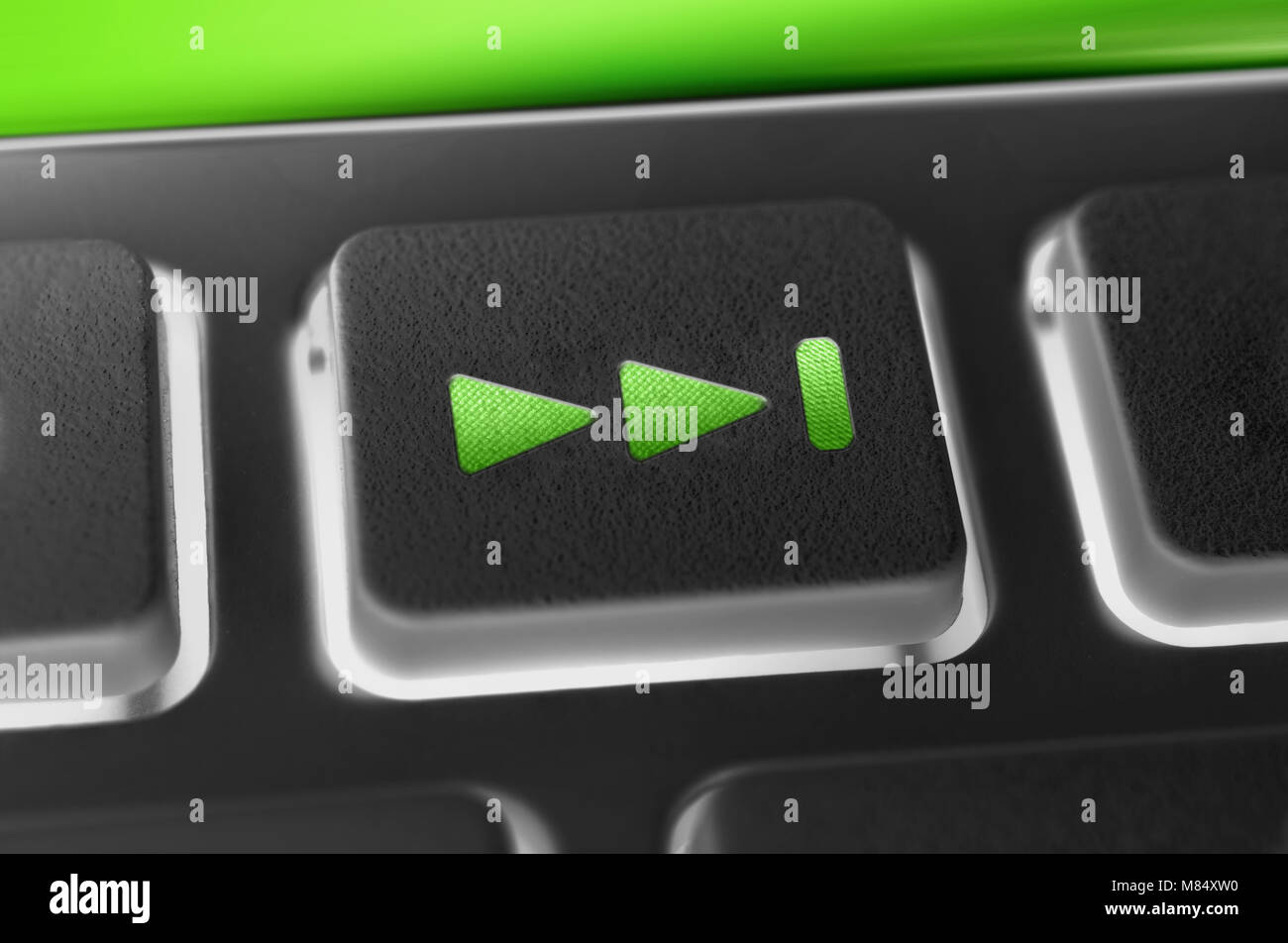 Macro Of A Black Skip Forward Button Of A Black Remote Control With ...