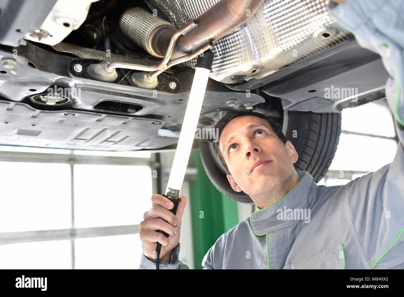 Mechanic inspects vehicle auto hi-res stock photography and images - Alamy