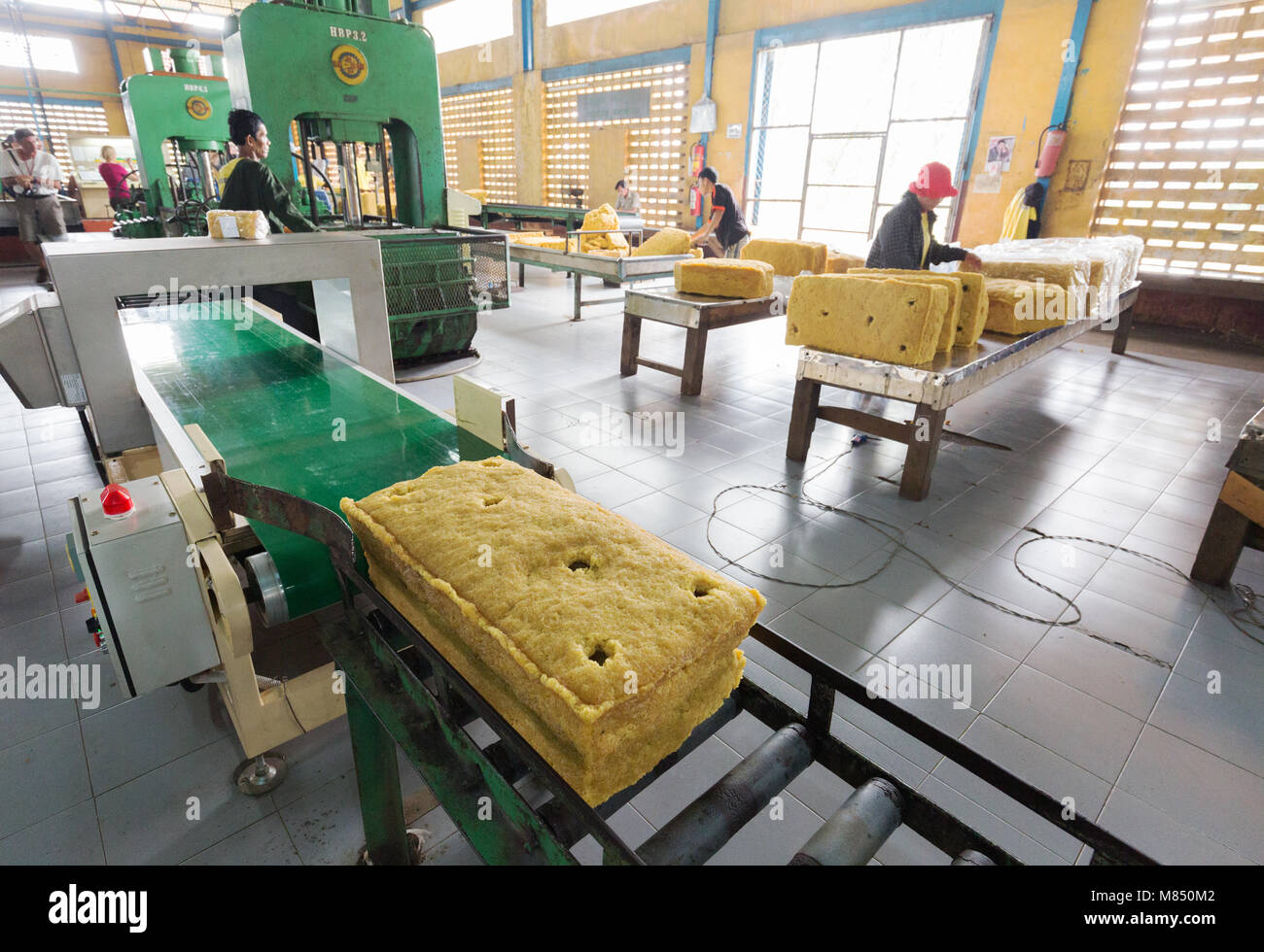 Rubber factory, Cambodia, Asia - workers producing rubber in a rubber ...