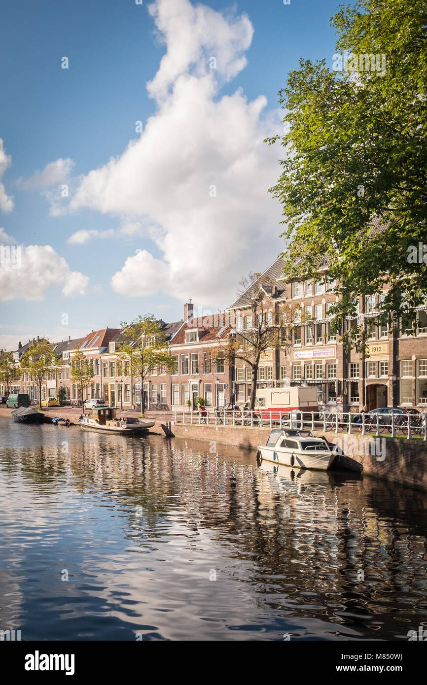 A scene of a canal in Haarlem, the Netherlands, on a sunny, summer day ...