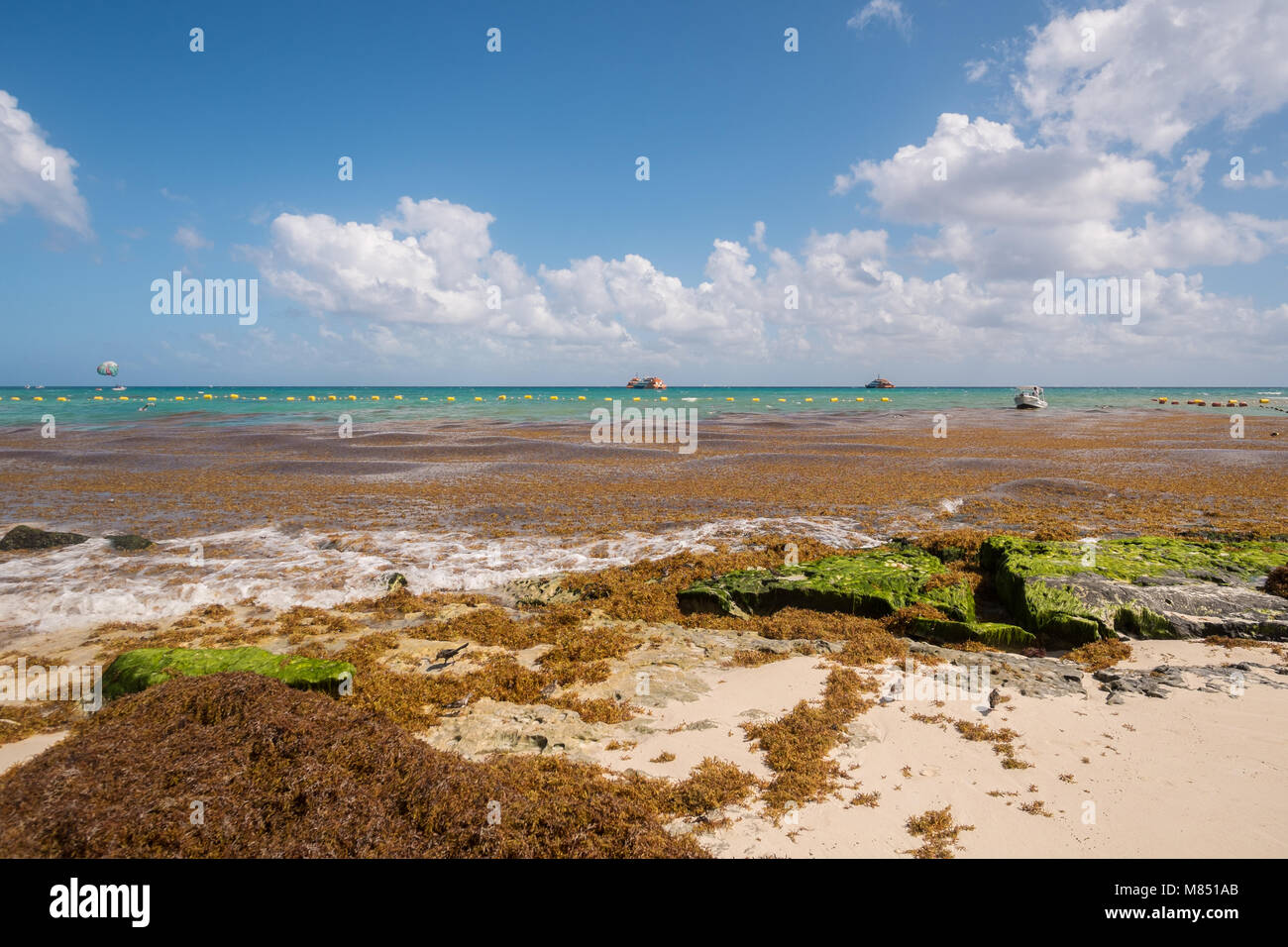 Fishing boats on Cancun Beach Stock Photo - Alamy