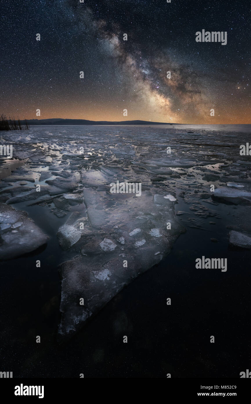 An image of frozen lake under the stars Stock Photo - Alamy