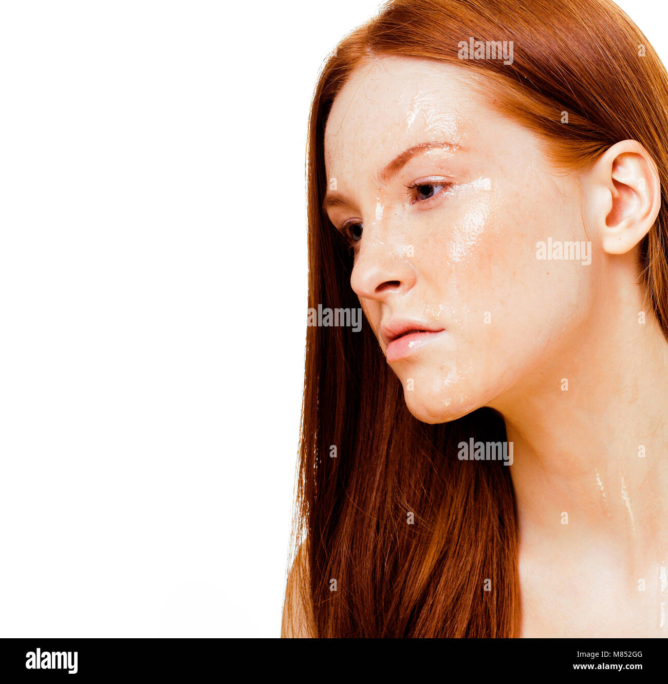 red hair woman with drops on her face Stock Photo - Alamy