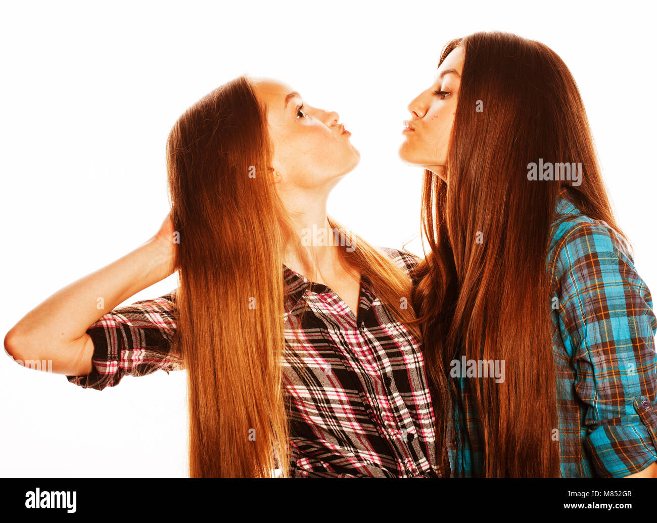 two cute teenagers having fun together isolated on white Stock Photo ...