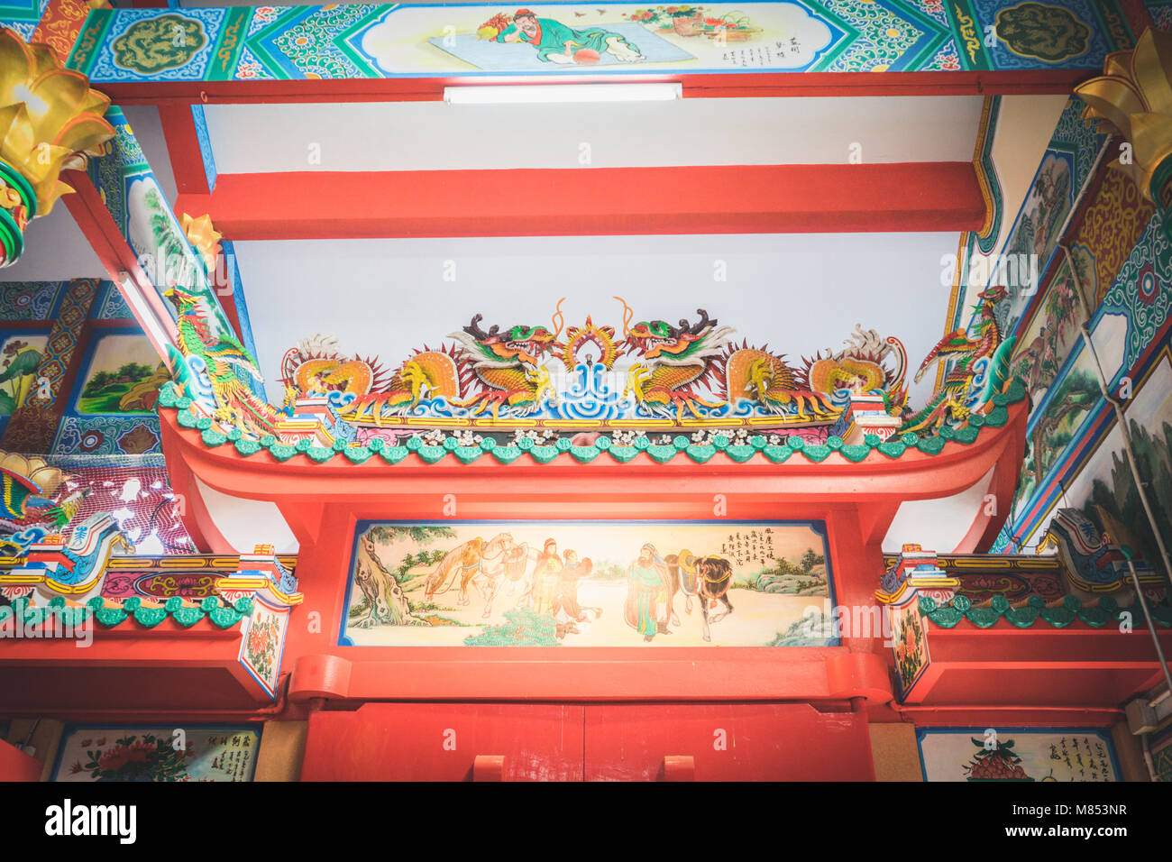 Colorful dragon column at Chinese shrine soars into blue sky Stock ...