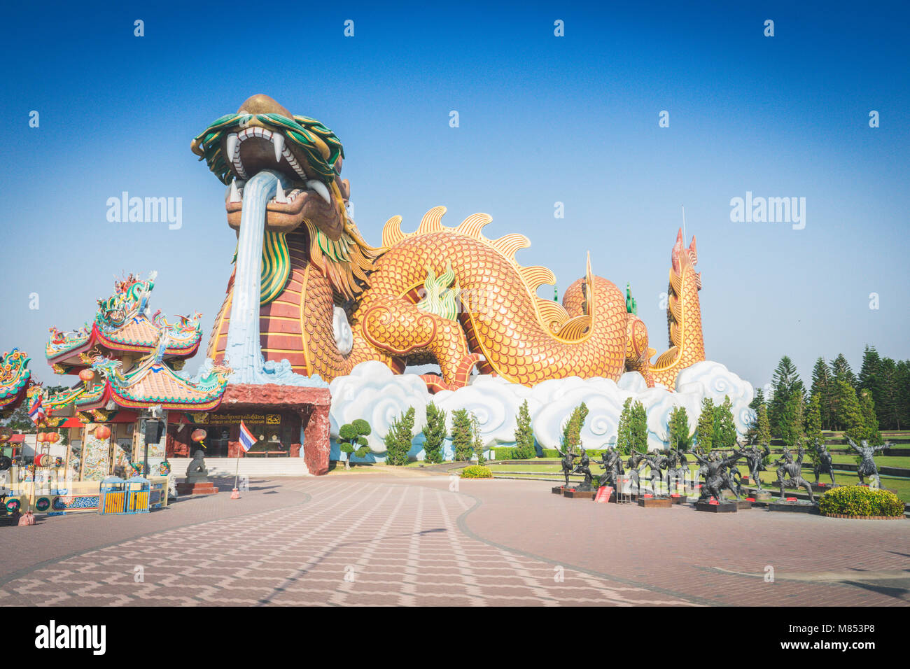 Colorful dragon column at Chinese shrine soars into blue sky Stock ...