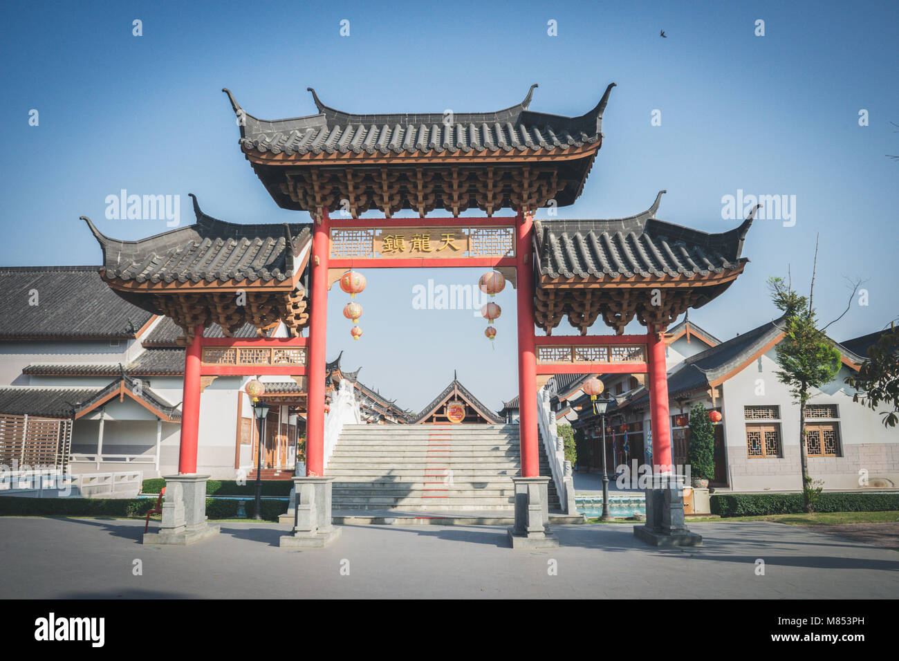 Colorful dragon column at Chinese shrine soars into blue sky Stock ...