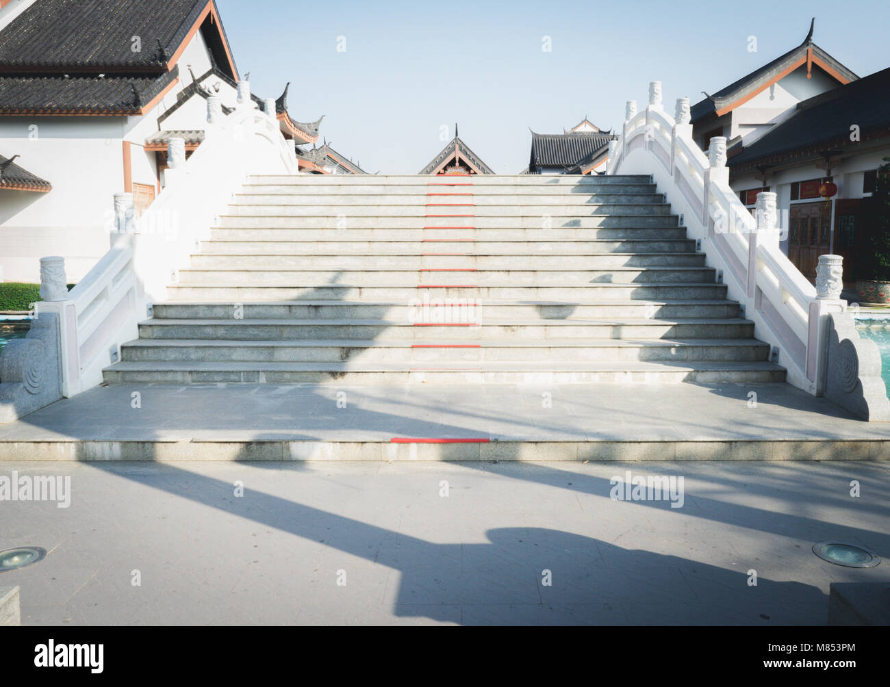 Colorful dragon column at Chinese shrine soars into blue sky Stock ...