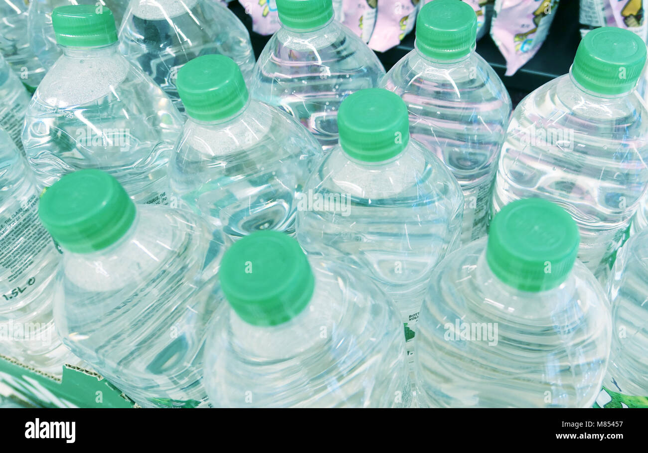 Close up shot of plastic bottles with water Stock Photo - Alamy