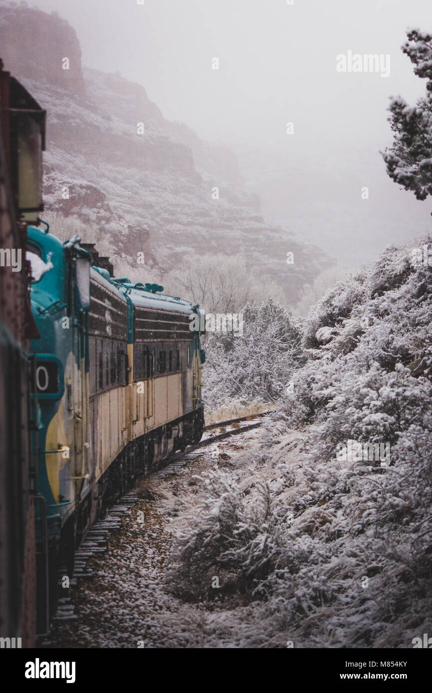 Train passenger perspective of the winding Verde Canyon Railroad with ...