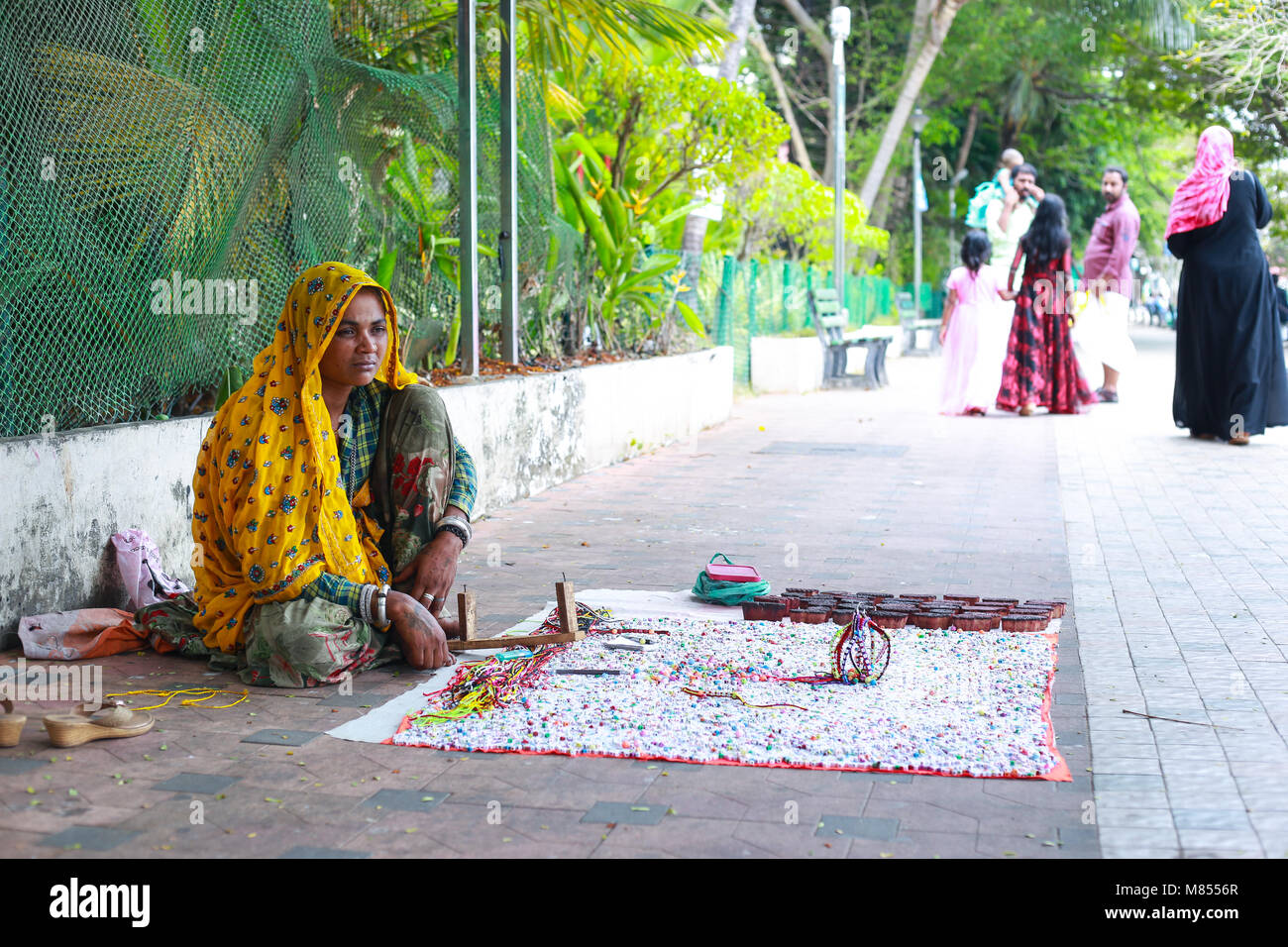 Indian footpath seller girl Stock Photo - Alamy