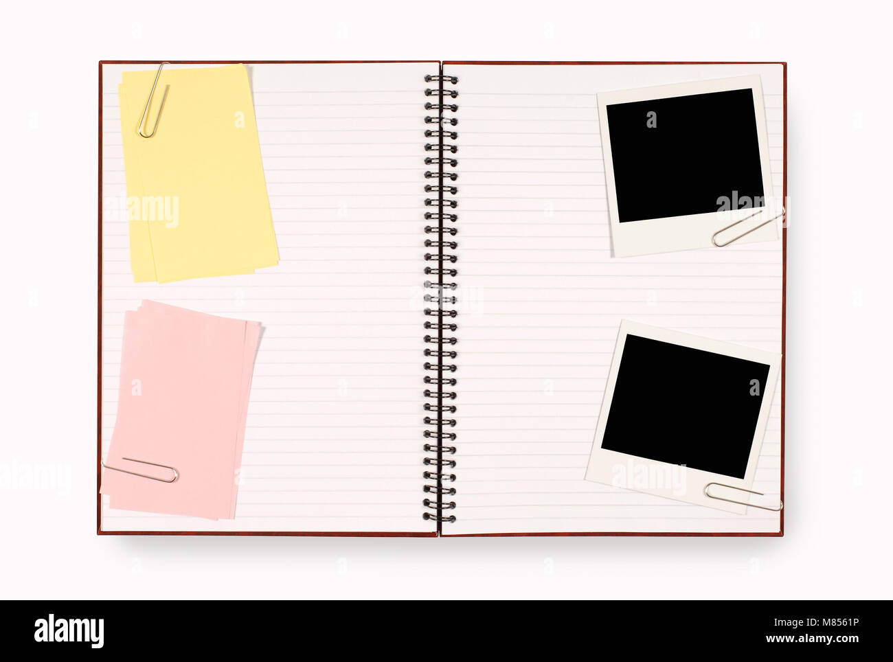 Writing book or scrapbook with various sticky notes and blank instant ...