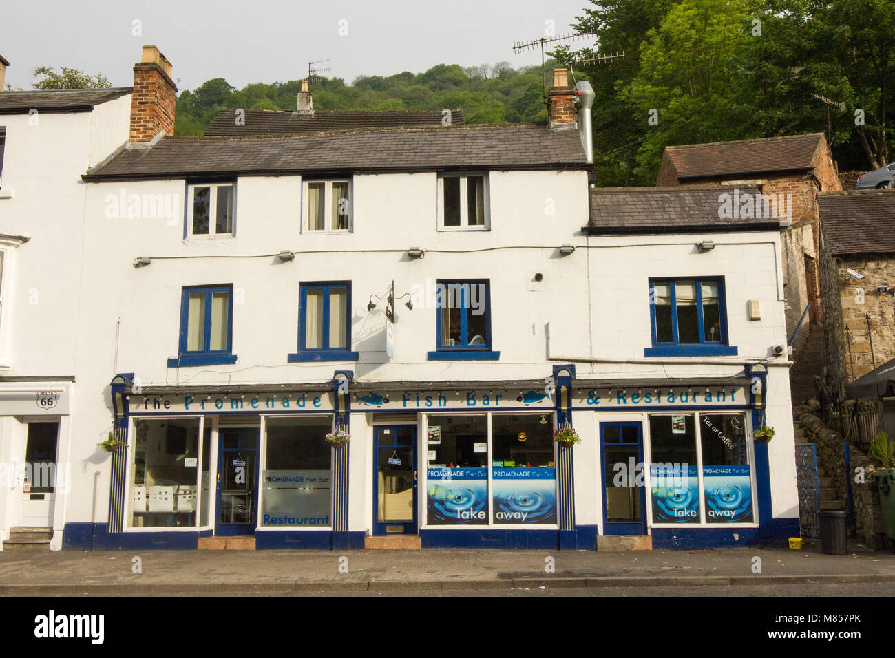 Matlock bath fish and chips shop front, sunny day, white front building ...