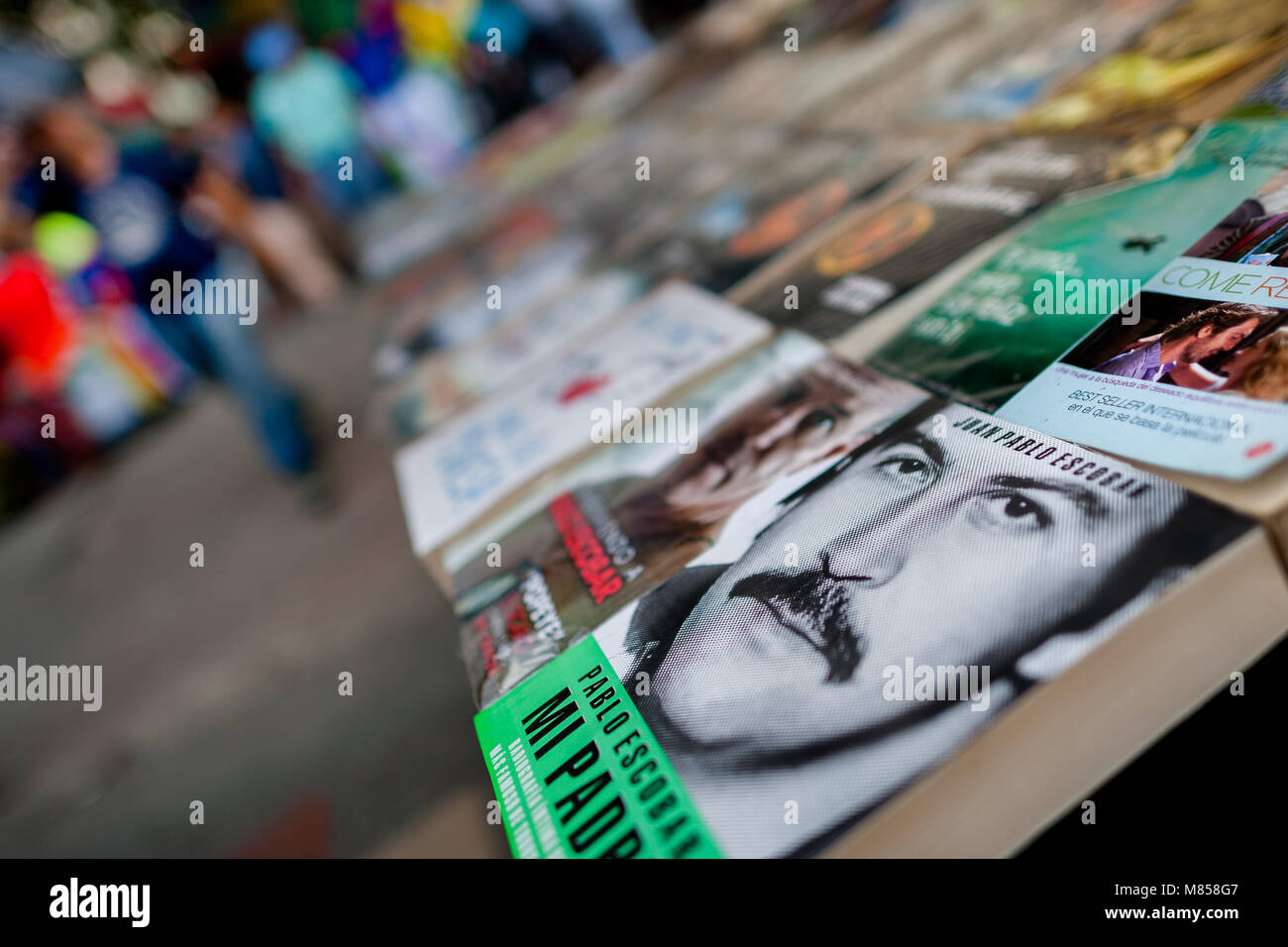 A paperback book, depicting the drug lord Pablo Escobar on the cover ...