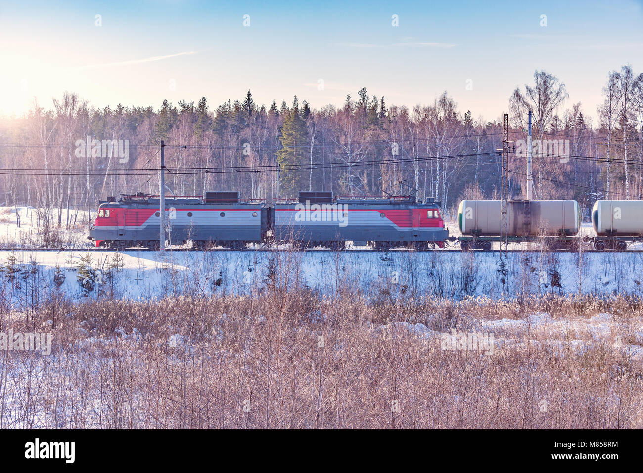 Freight train at cold winter morning time Stock Photo - Alamy