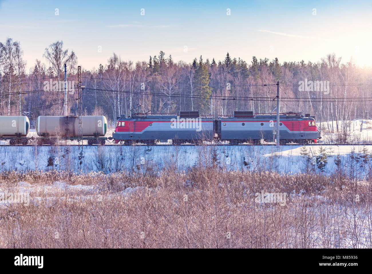 Freight train at cold winter morning time Stock Photo - Alamy