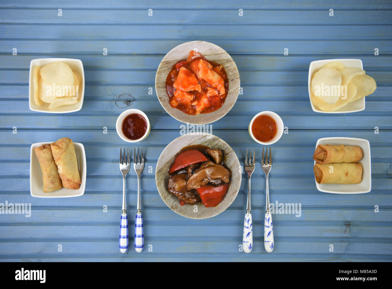 Chinese take away night with food in dishes cooked and served on a ...