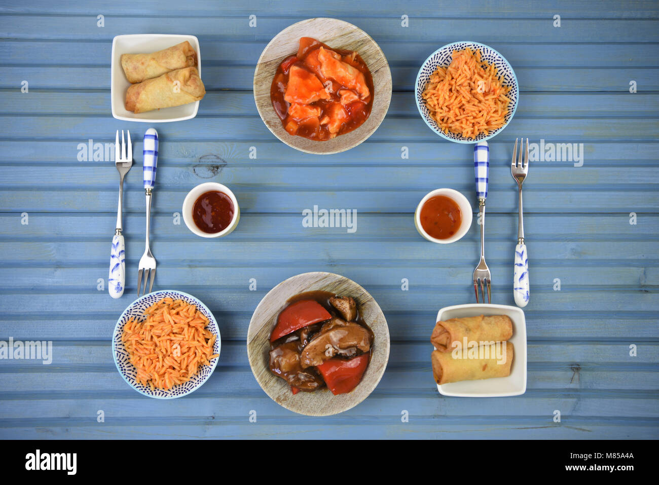 Chinese take away night with food in dishes cooked and served on a ...