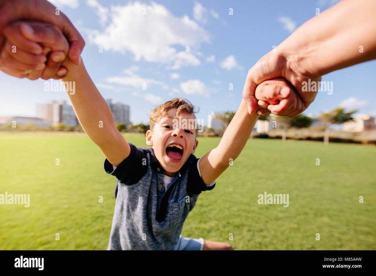 Child being lifted High Resolution Stock Photography and Images - Alamy