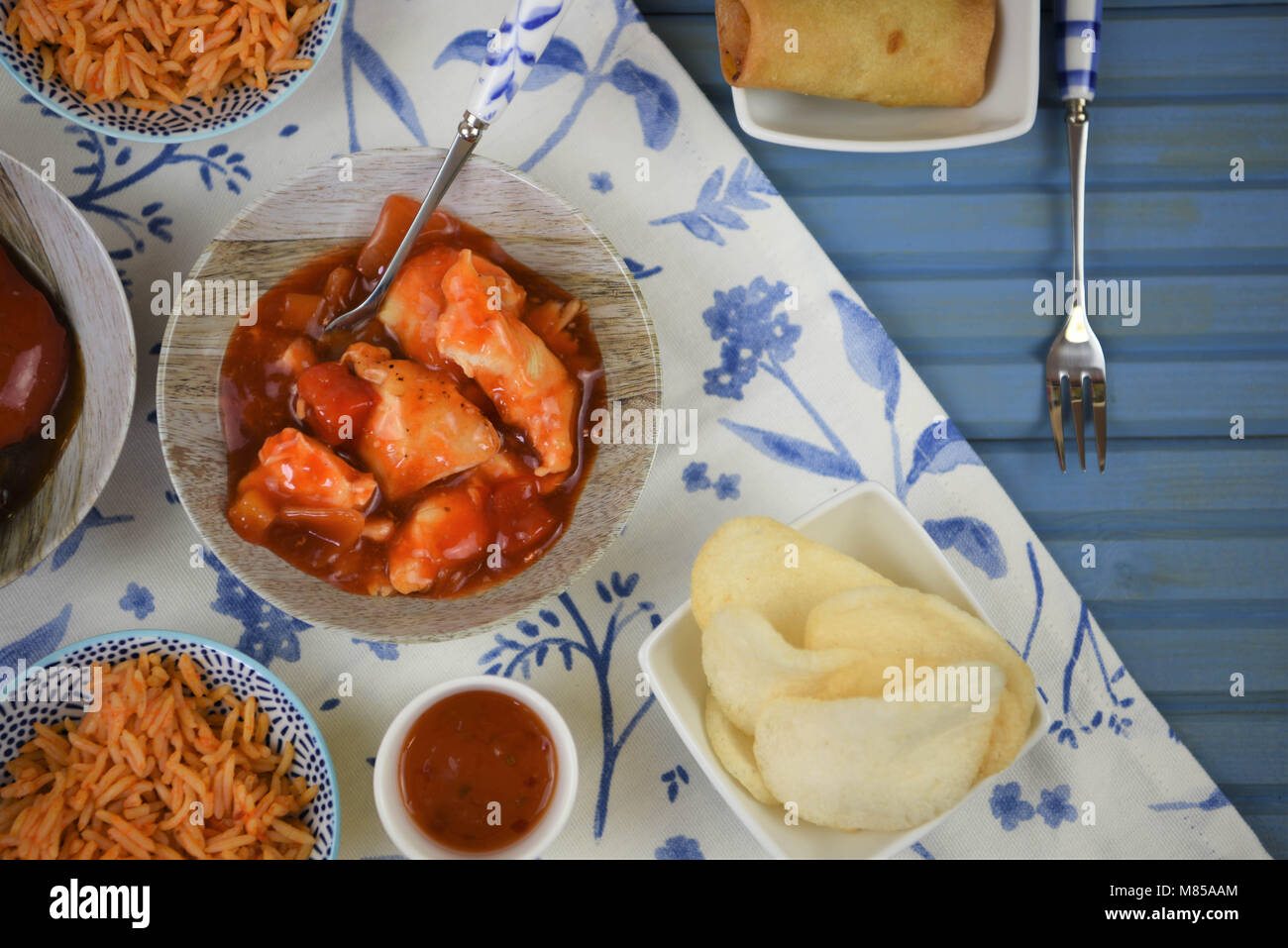 Chinese take away night with food in dishes cooked and served on a ...