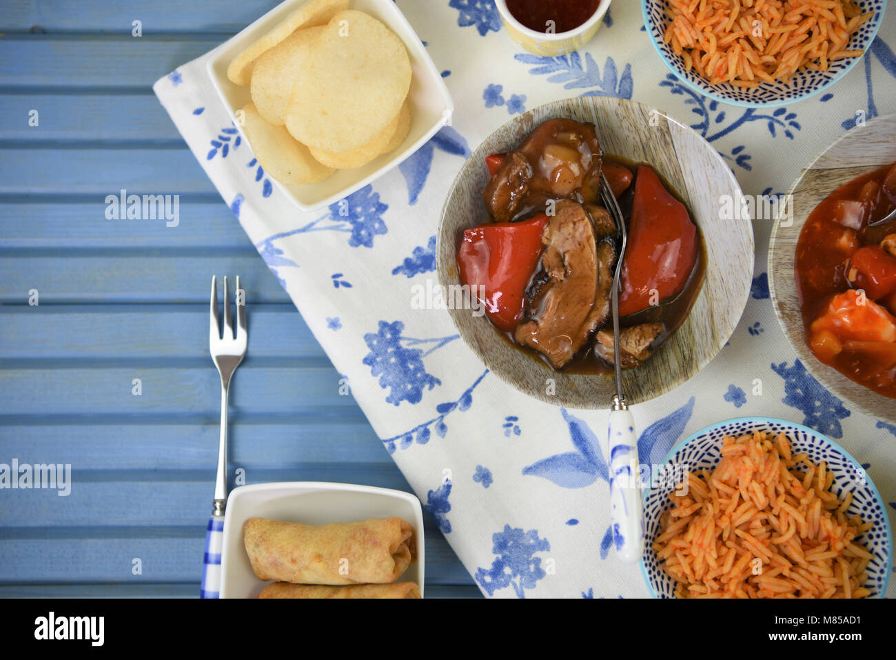 Chinese take away night with food in dishes cooked and served on a ...