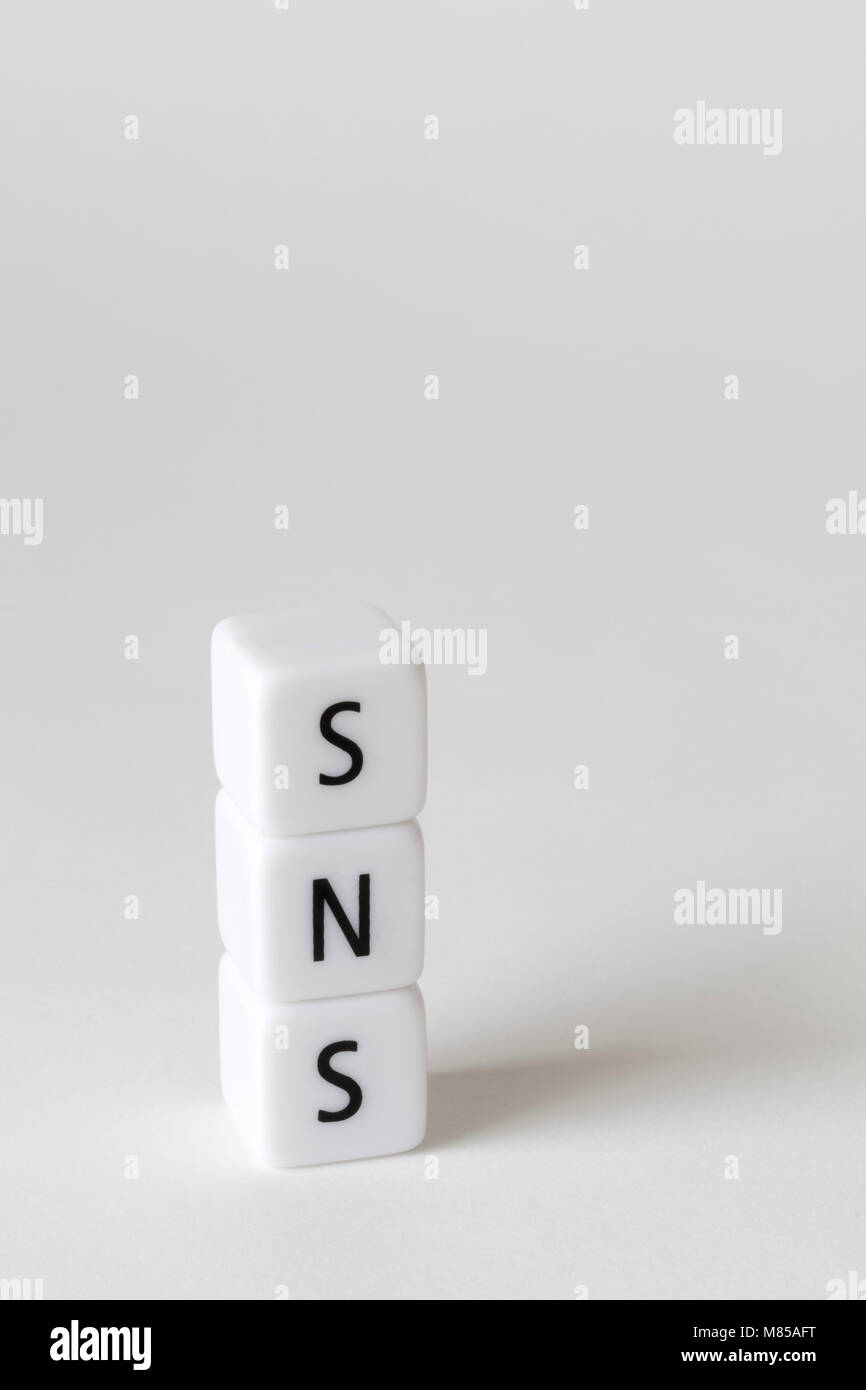 White cube written as SNS Stock Photo - Alamy