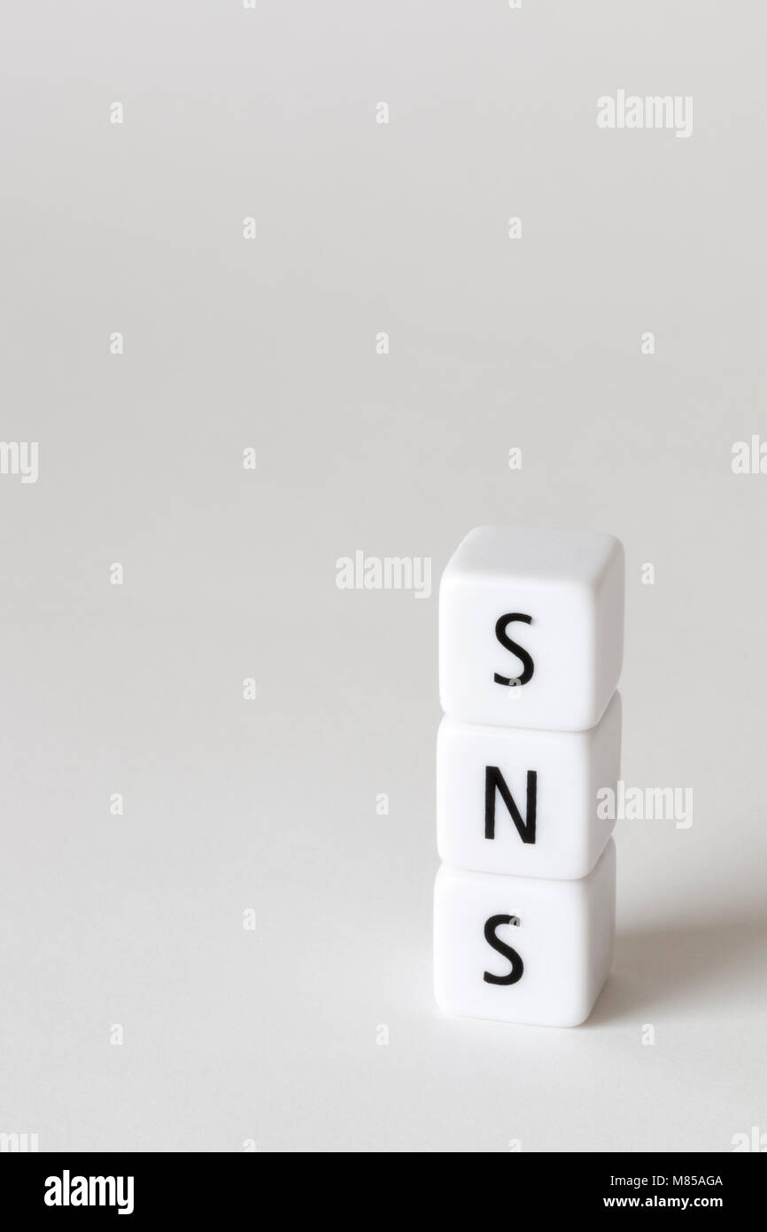 White cube written as SNS Stock Photo - Alamy